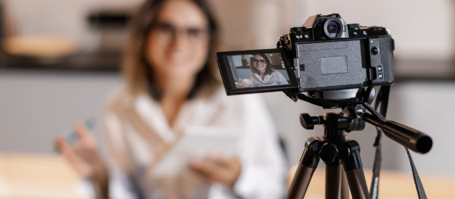 How to Hold Camera While Vlogging: YouTube Beginners Guide